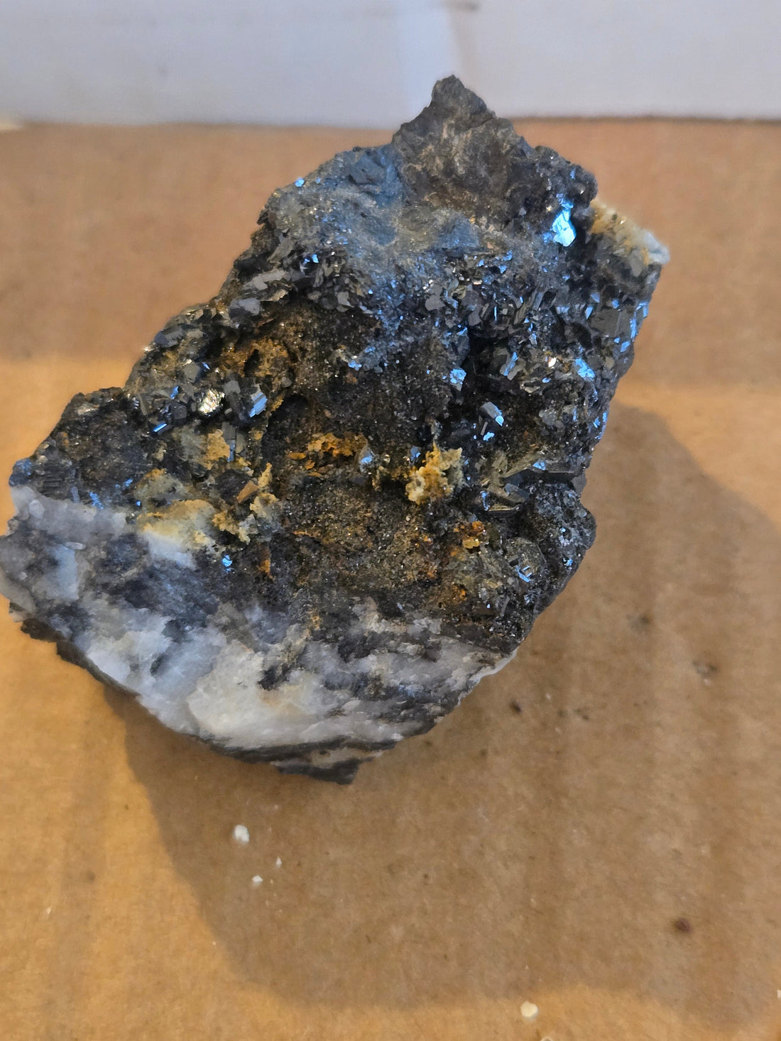 Groutite crystals in matrix - Adam's Minerals LLC